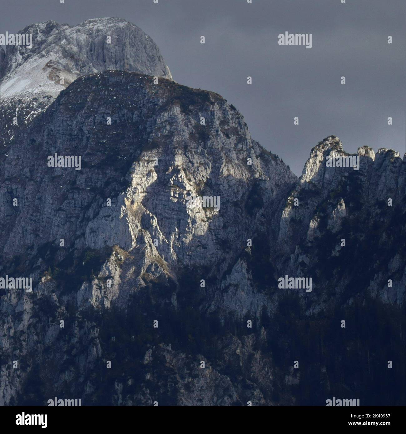a Cone of Light appears between two Mountains Stock Photo - Alamy