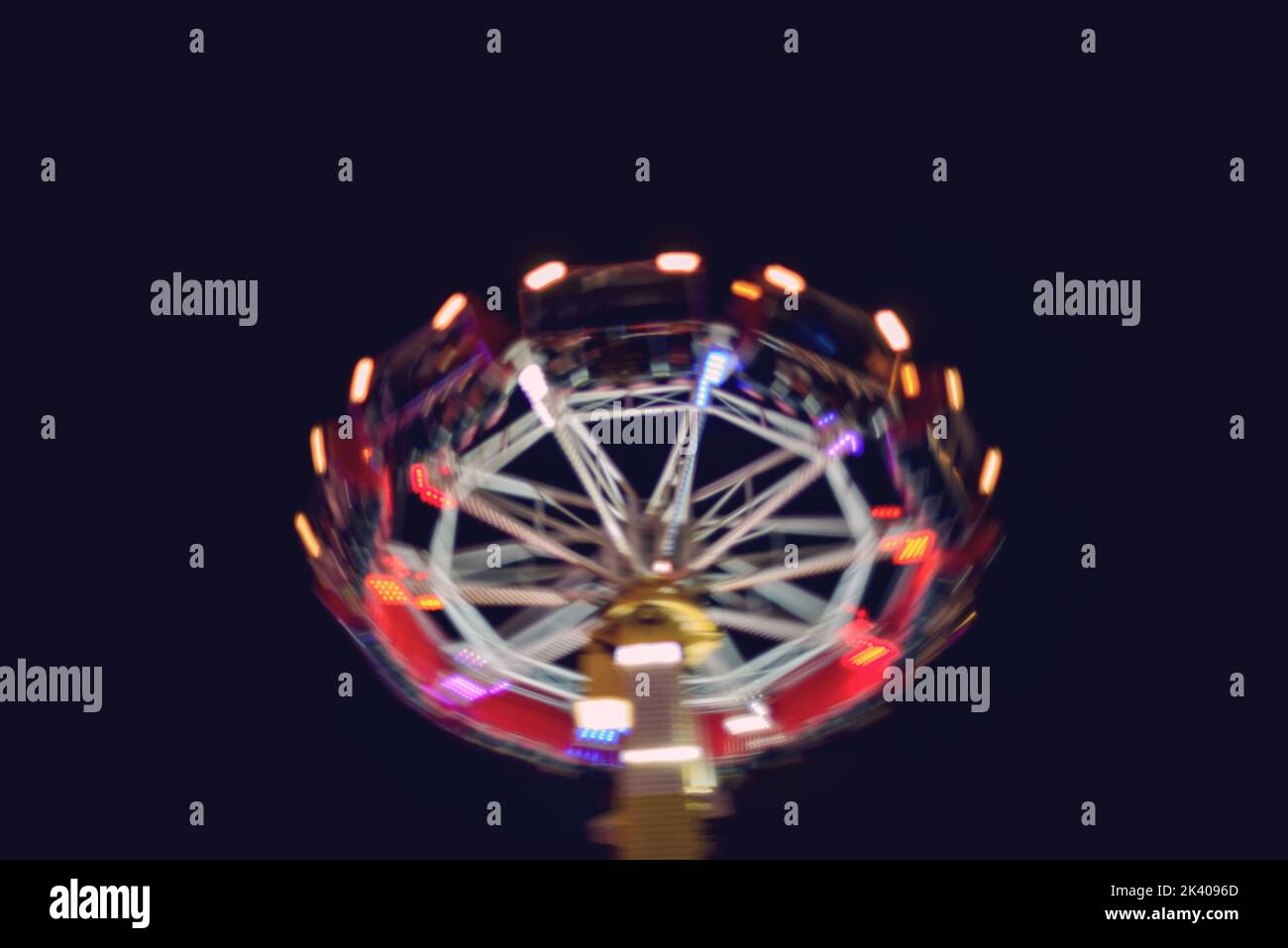 Defocused and motion blurred photo of Evolution named fun device in the ...