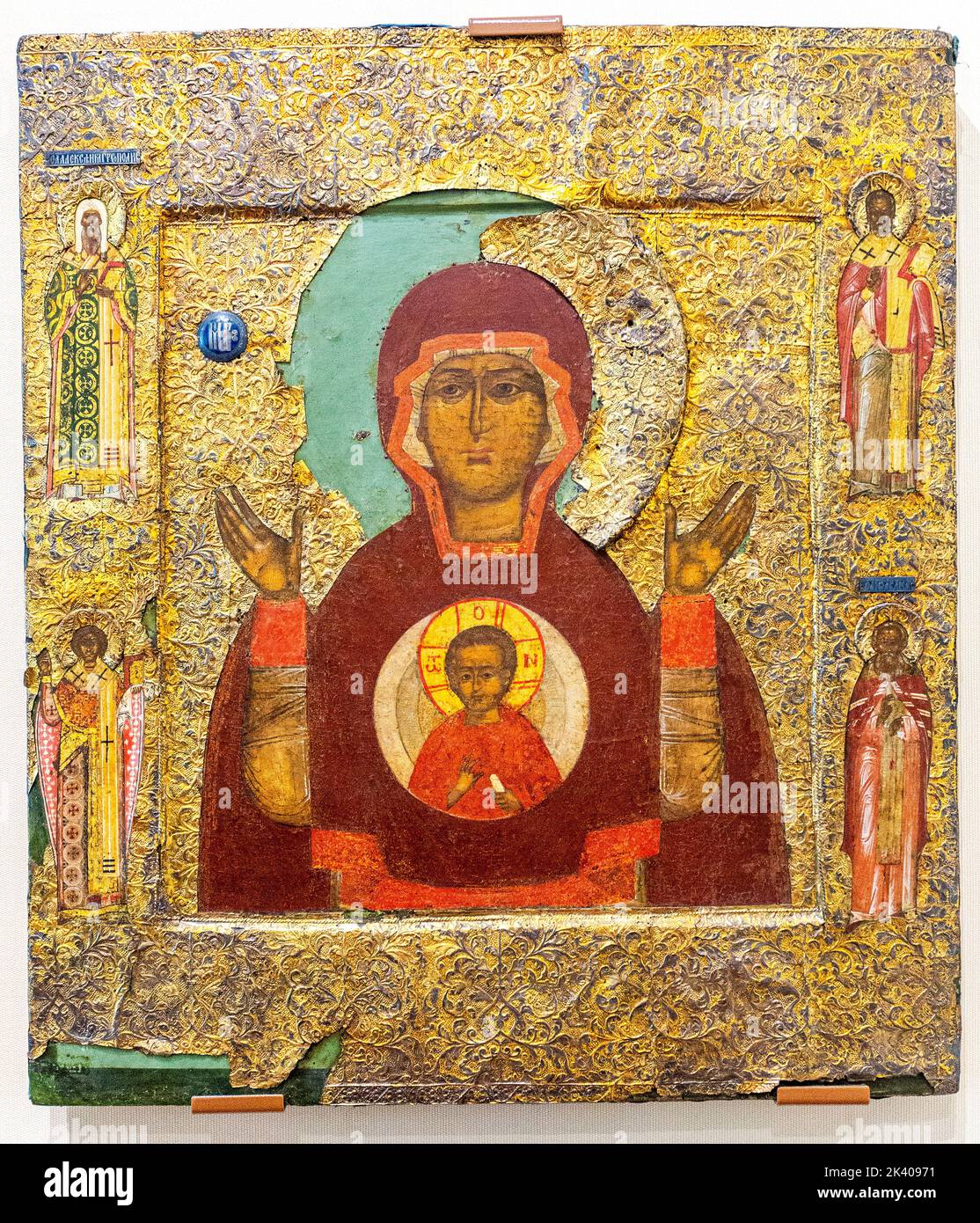 Antique Russian orthodox icon painted on wooden board. The Mother of God of the Sign with Saints ...
