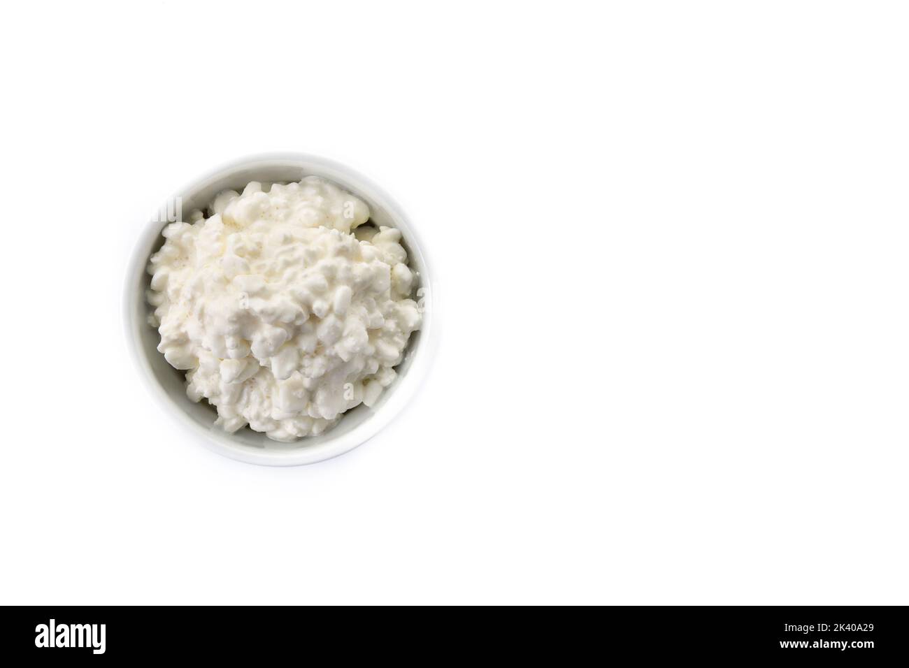 Fresh cottage cheese isolated on white background. Top view. Copy space ...