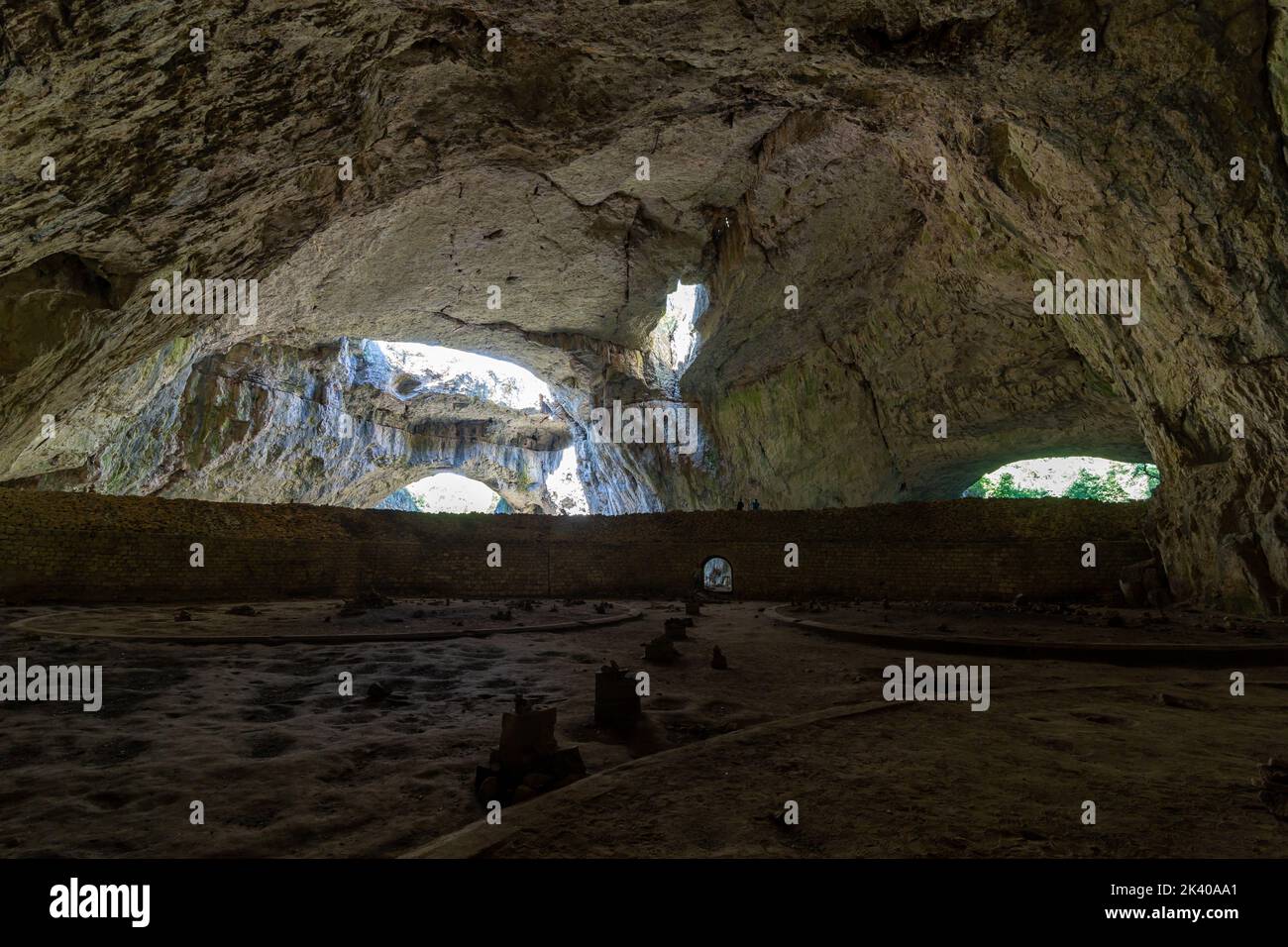 The giant Devetashka Cave with amazing ecosystem inside. Located near ...