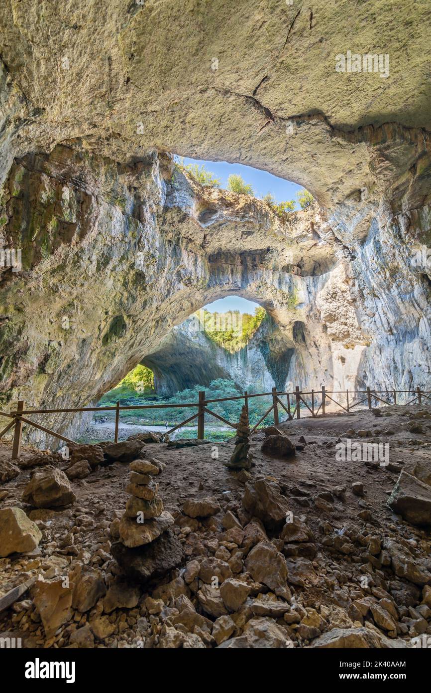 The giant Devetashka Cave with amazing ecosystem inside. Located near ...