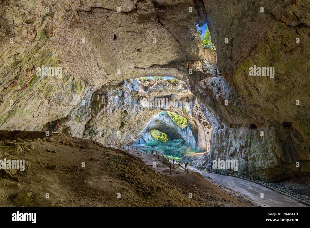 The giant Devetashka Cave with amazing ecosystem inside. Located near ...