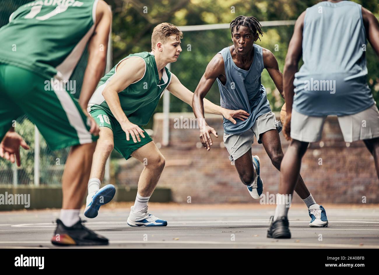 Energy, fitness and basketball at basketball court with team playing in ...