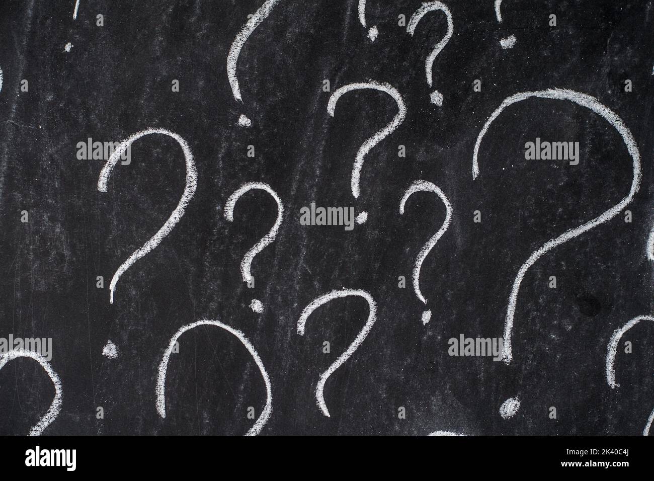 Question marks drawn with chalk on the school board Stock Photo - Alamy