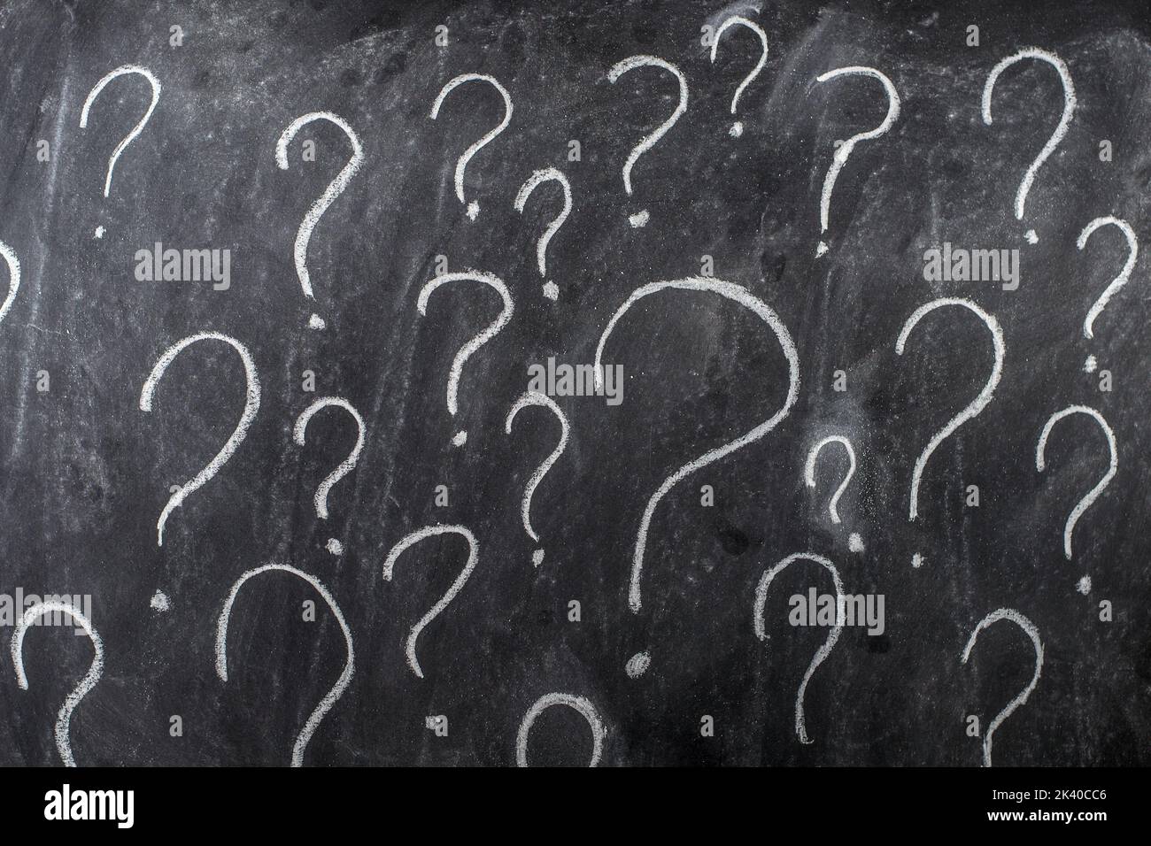Question marks drawn with chalk on the school board Stock Photo - Alamy
