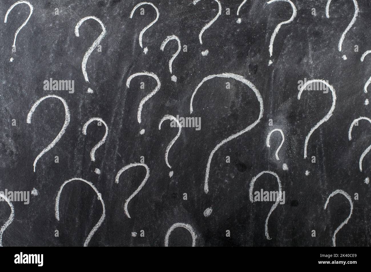 Question marks drawn with chalk on the school board Stock Photo - Alamy