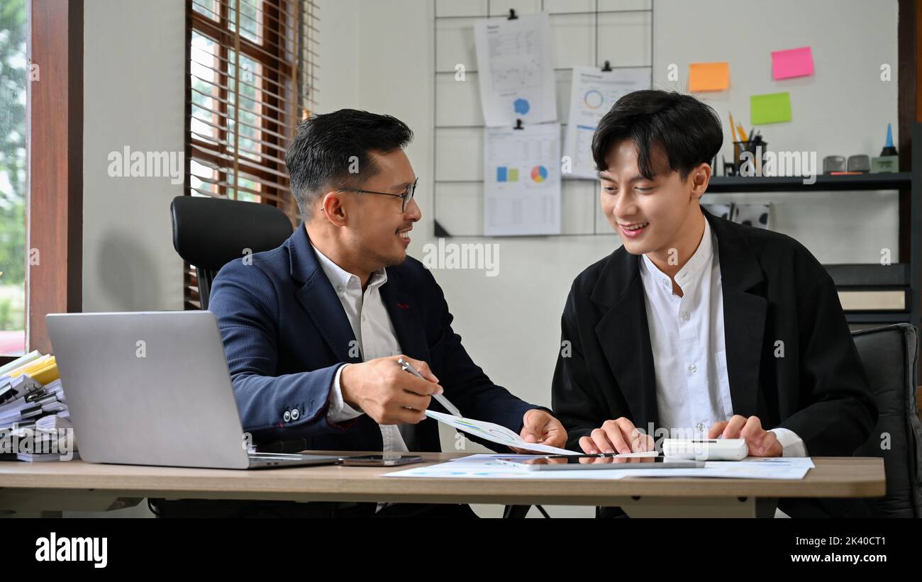 Professional Asian male financial analyst or male boss in formal suit ...