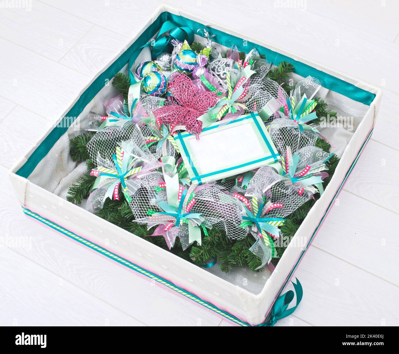 Christmas wreath inside gift box Stock Photo - Alamy