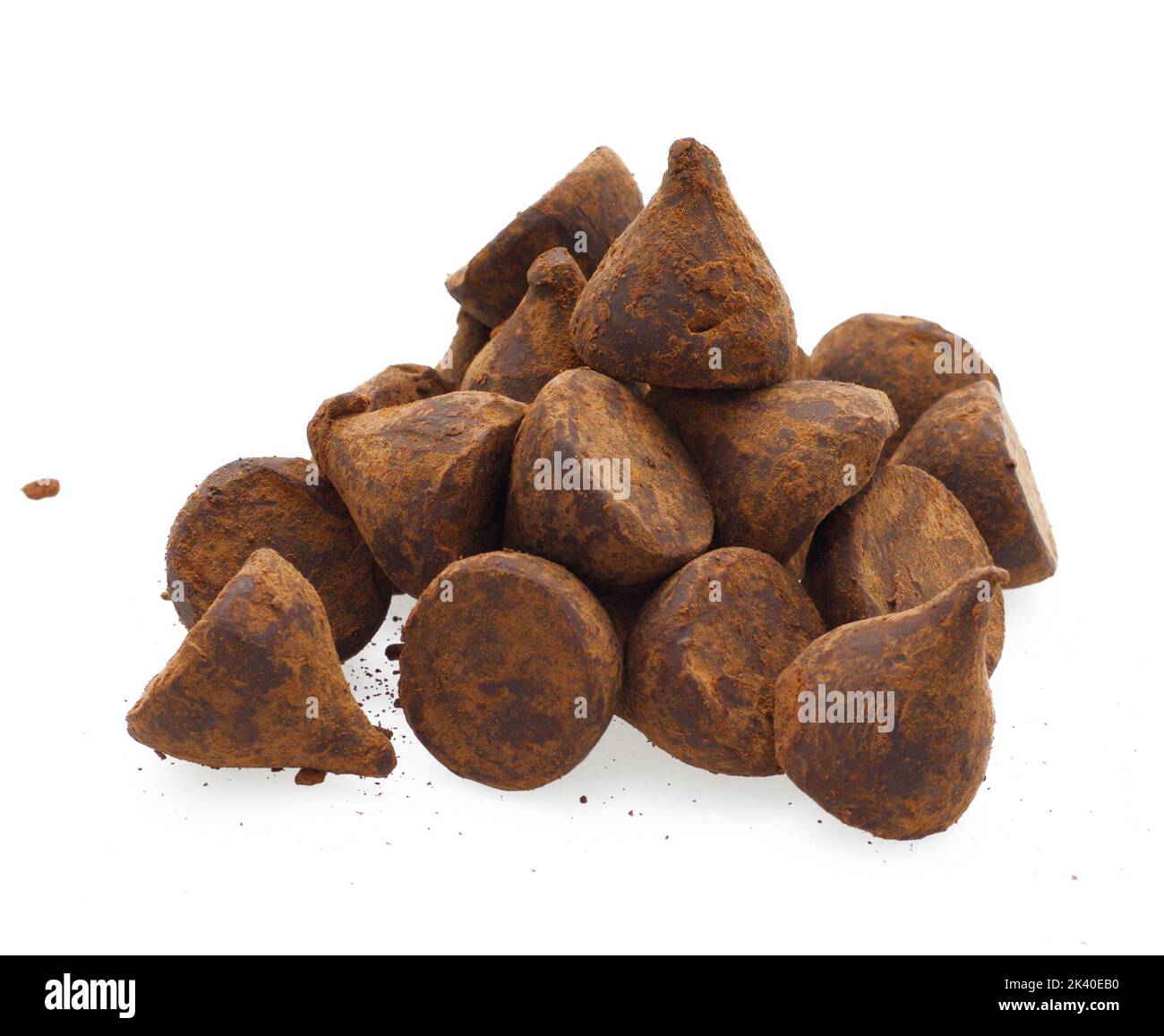 Chocolate truffles with sweet cream inside on the white background ...