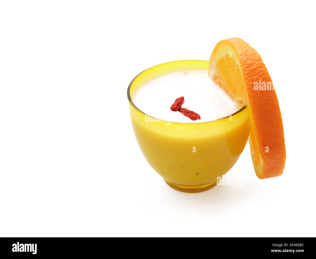 Strawberry yogurt and orange in yellow bowl Stock Photo - Alamy
