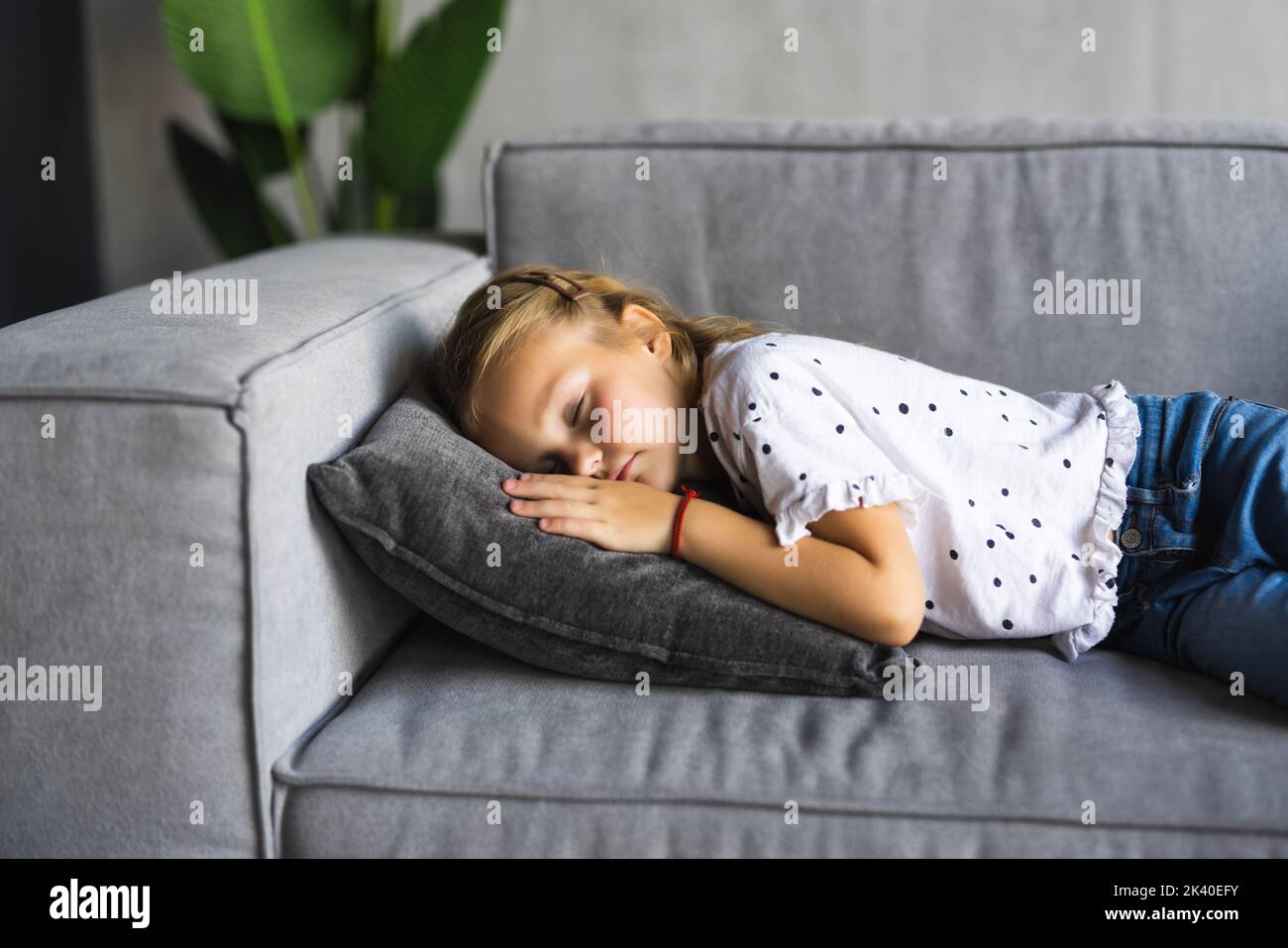 Sweet dreams. Cute little preteen girl sleep dream nap on cozy couch ...