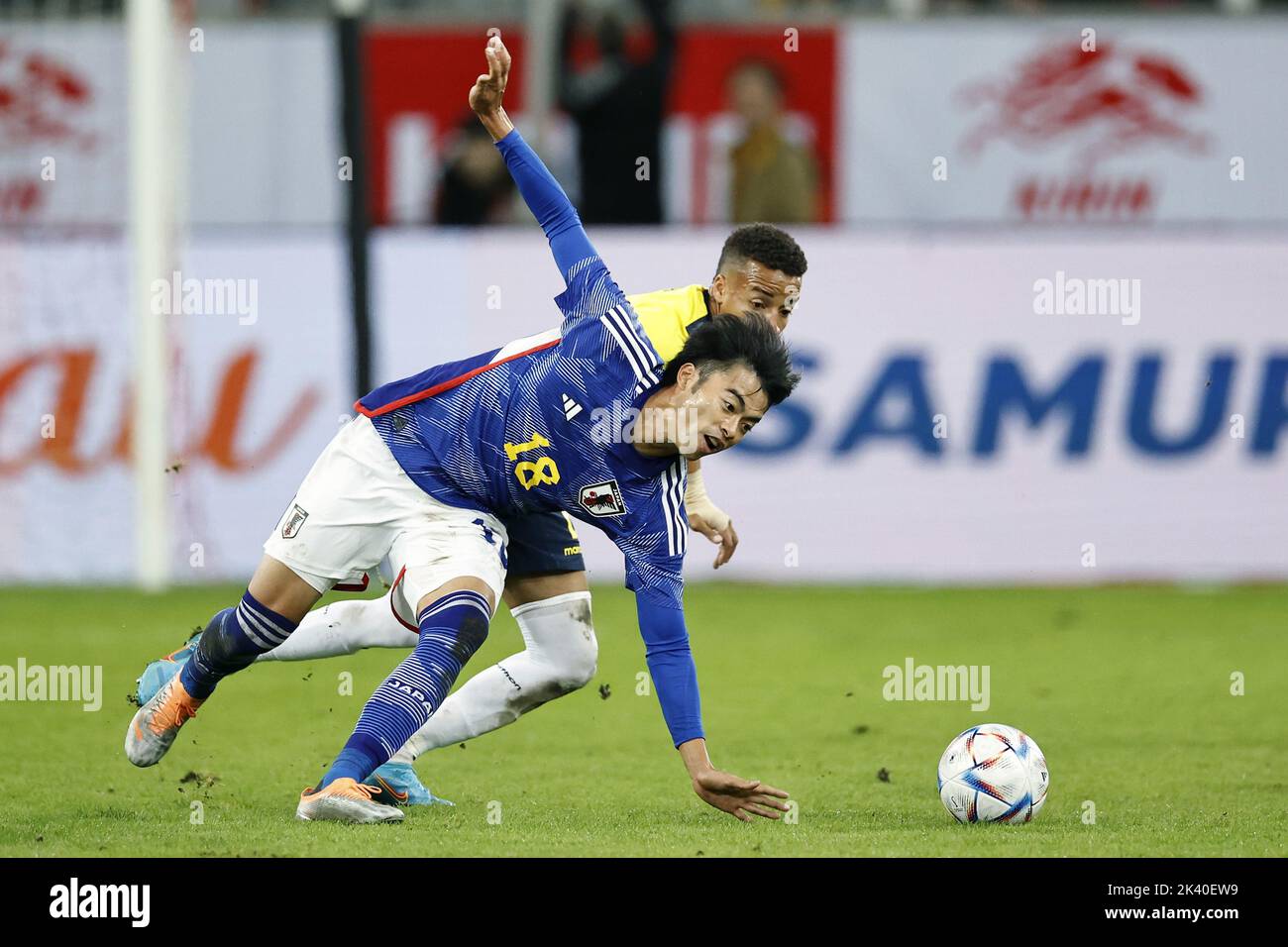 DUSSELDORF - (LR) Kaoru Mitoma of Japan, Byron Castillo of Ecuador ...