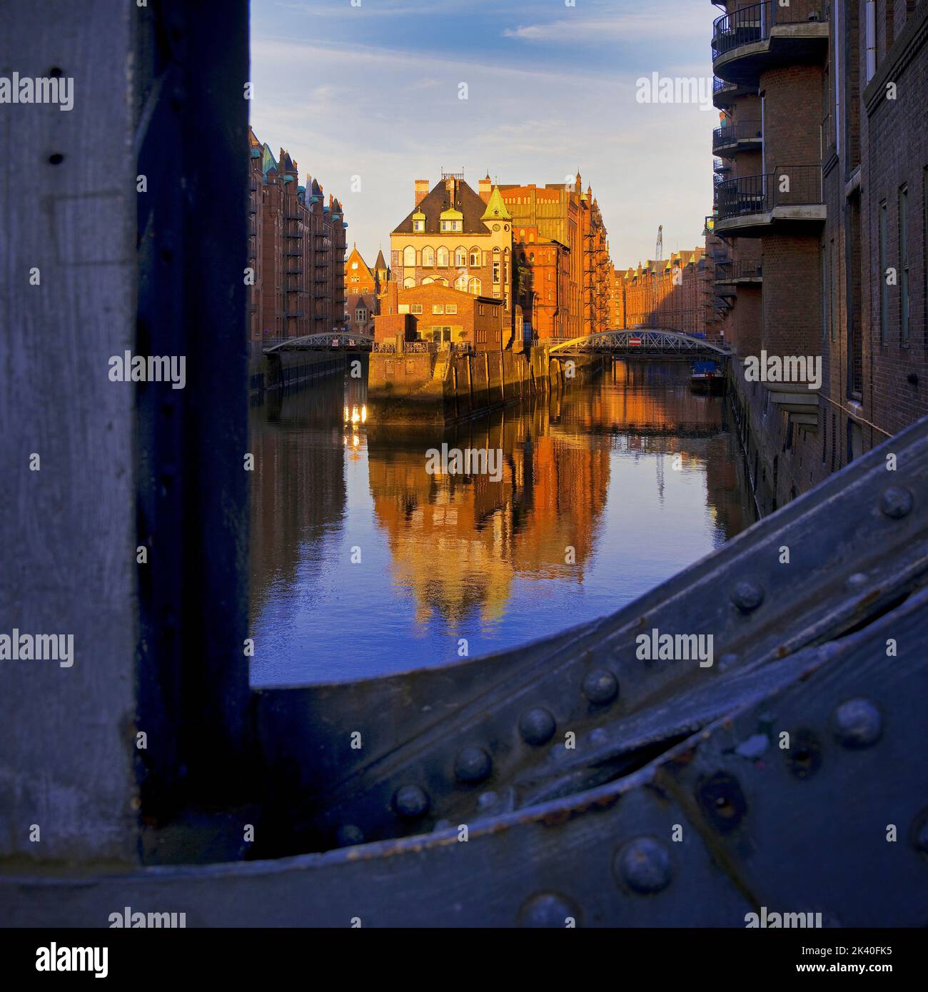 moated castle in the warehouse district of Hamburg at sunrise, Unesco ...