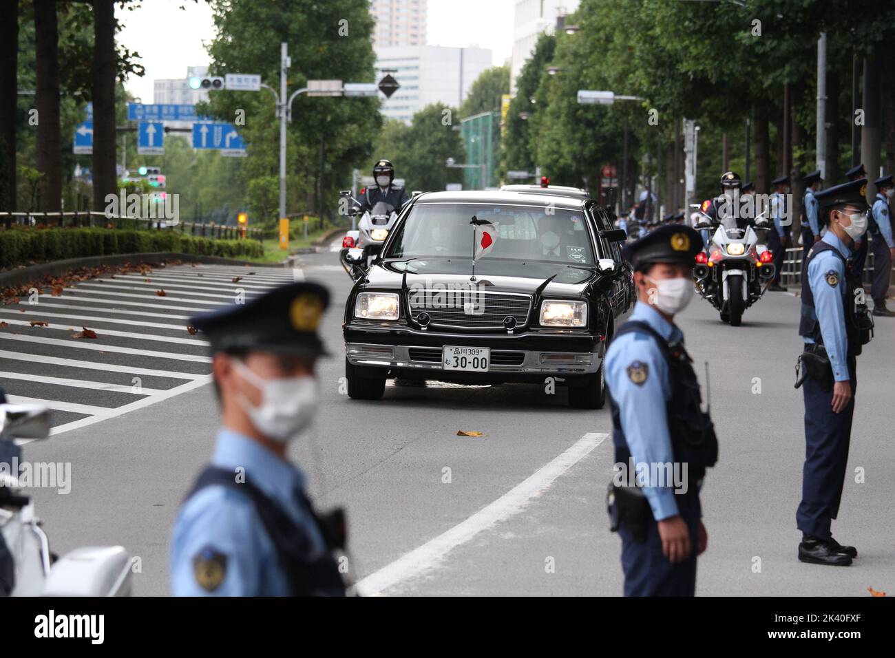 A vehicle carrying former Japanese Prime Minister Shinzo Abe's wife ...