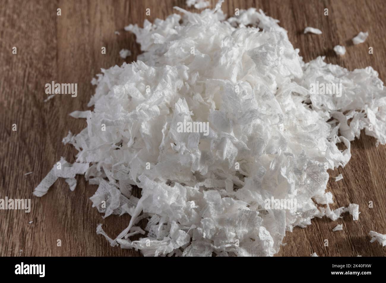 Paper litter substrate for rodents Stock Photo - Alamy