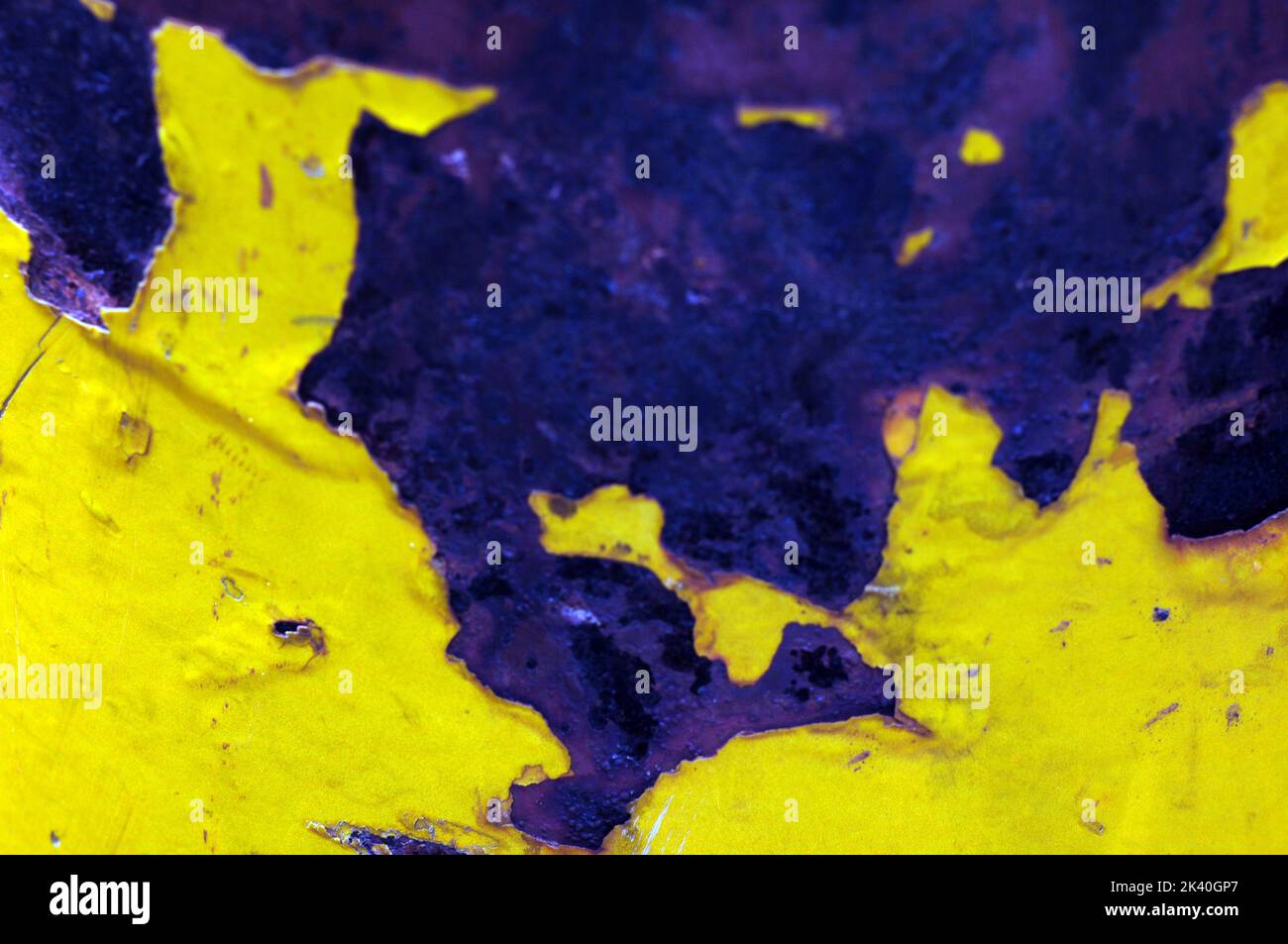 Yellow and purple painted metal with rust texture Stock Photo - Alamy