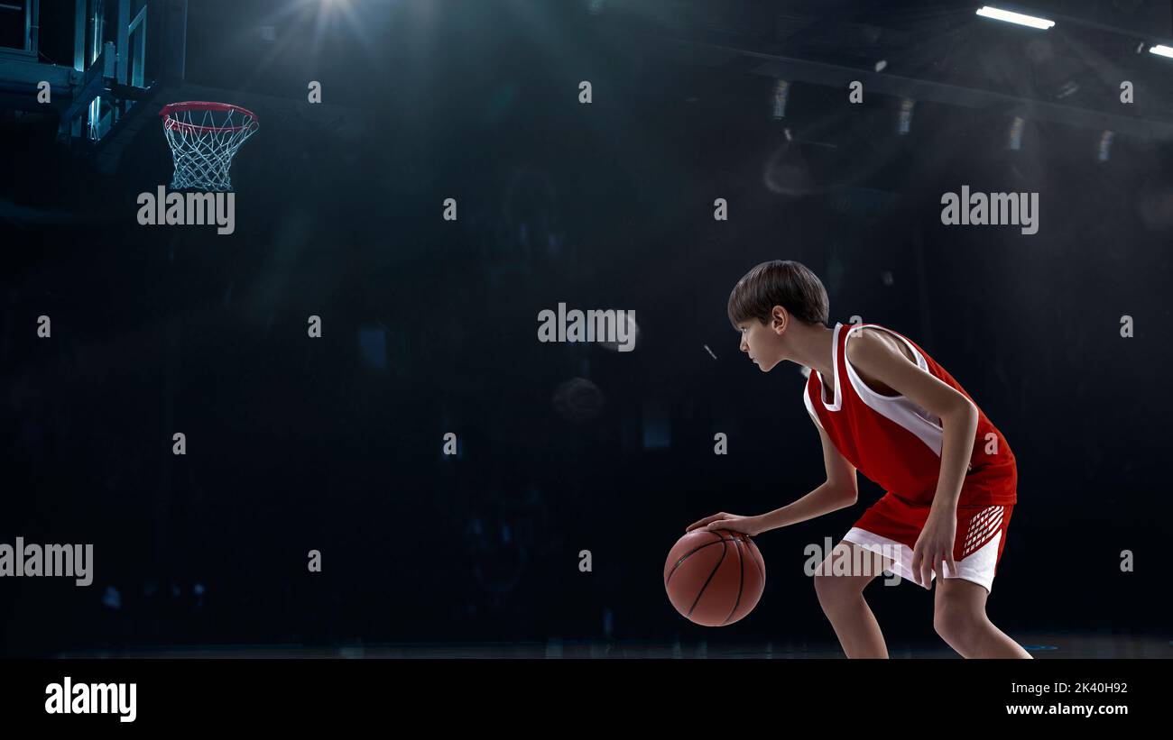 Portrait of teen boy, professional basketball player isolated over ...