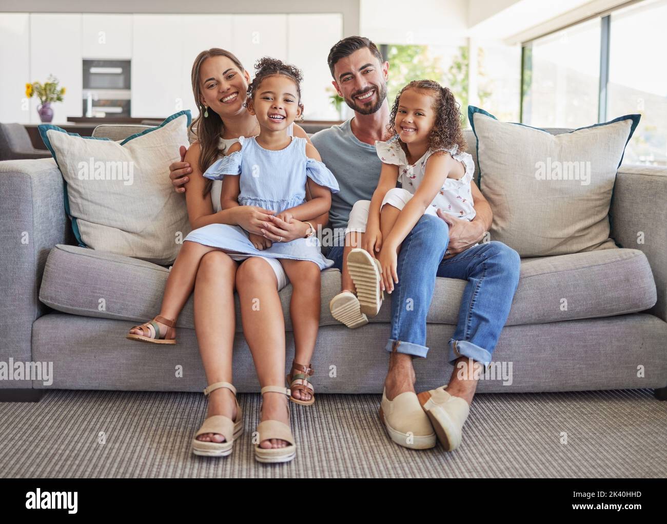 Family portrait, happy and smile of parents with kids relaxing on ...