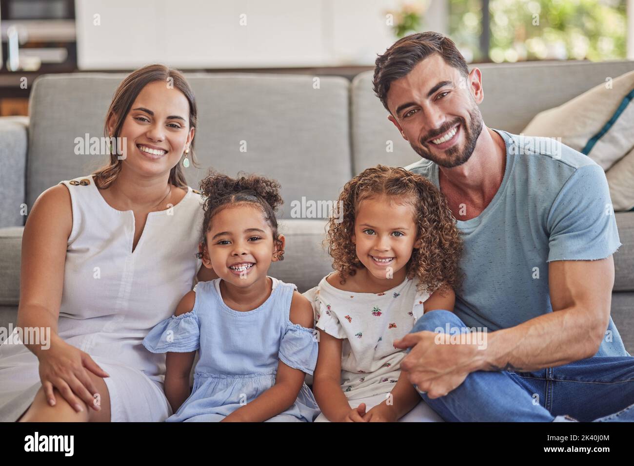 Portrait, happy family in home living room and smile bonding together ...