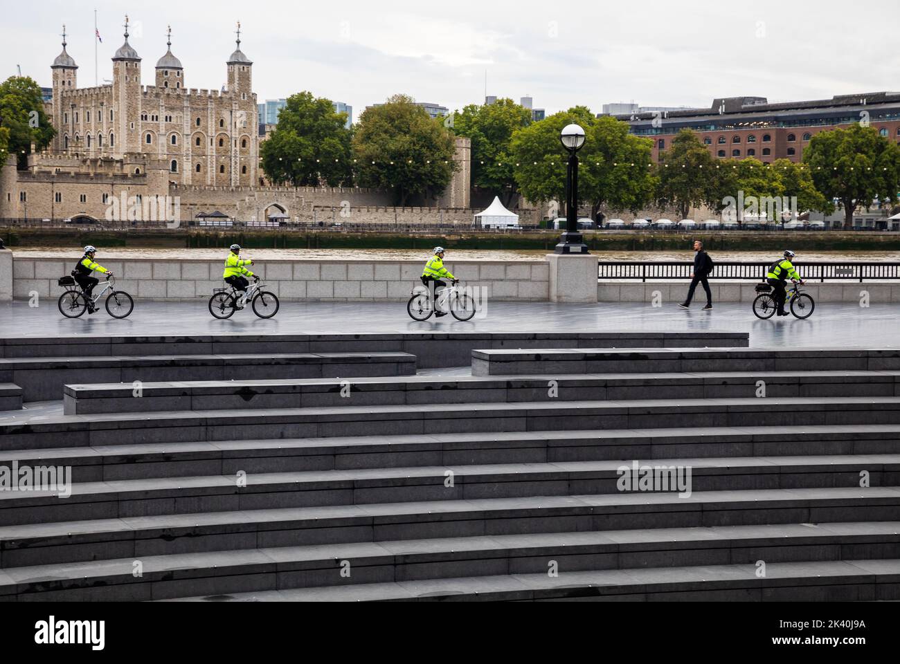 Police riding bikes along Queens walk in London, UK Stock Photo - Alamy