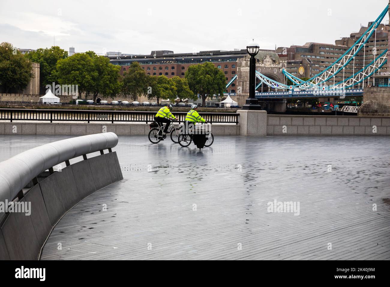Police riding bikes along Queens walk in London, UK Stock Photo - Alamy