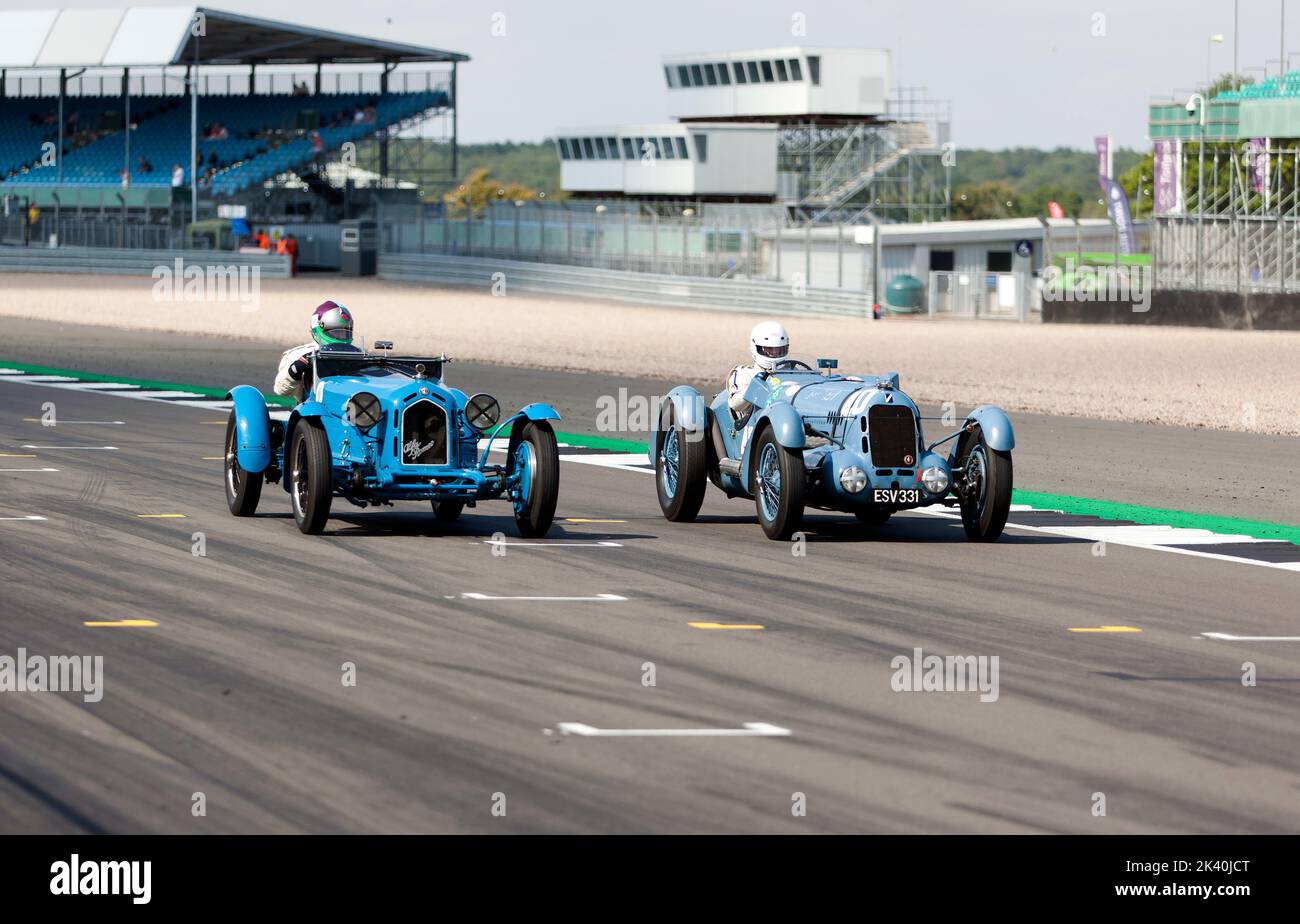 Till Bechtolsheimer in his 1936 Talbot Lago T150C side by side with ...