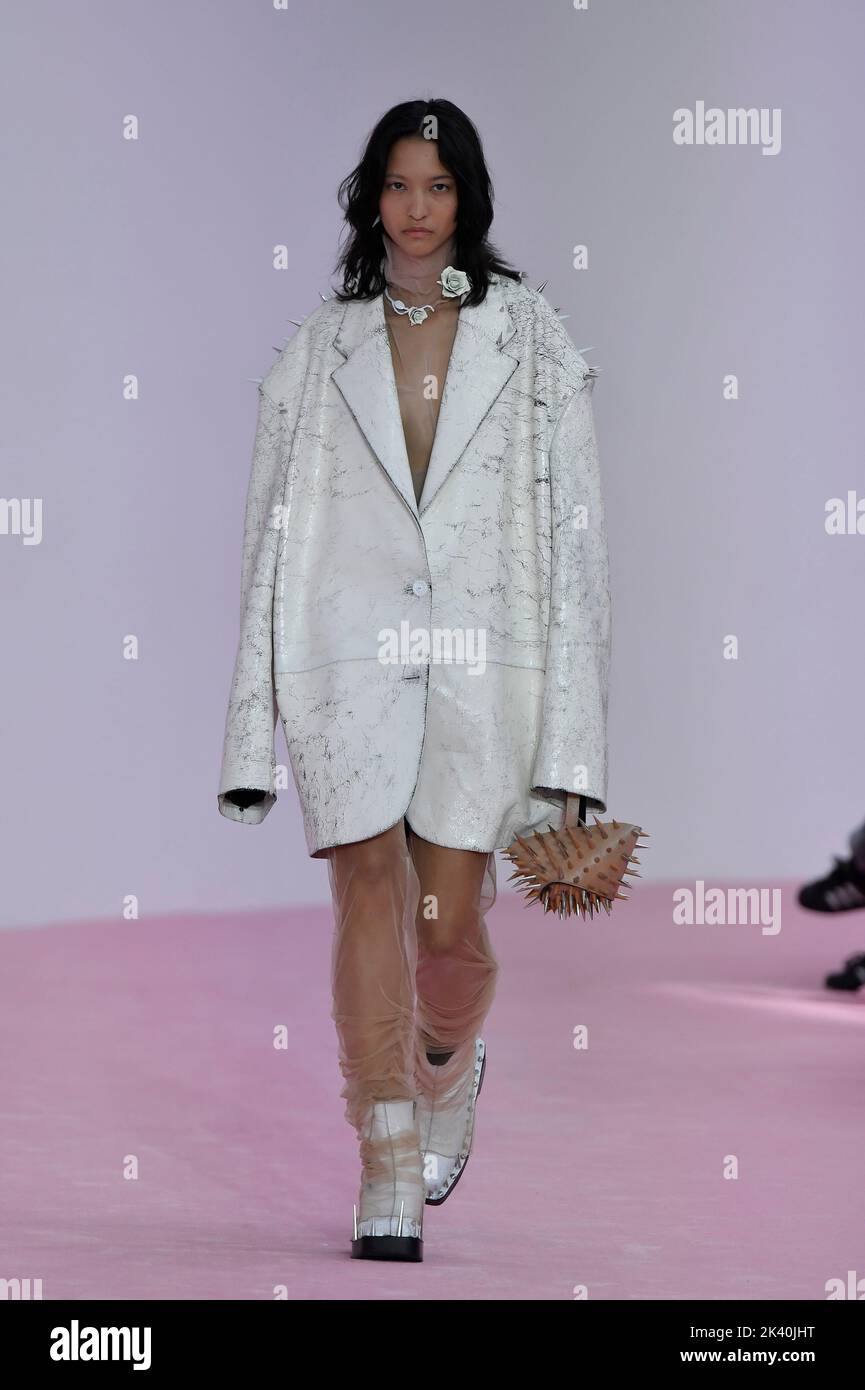 A model walks on the runway at the Acne fashion show during the Spring ...