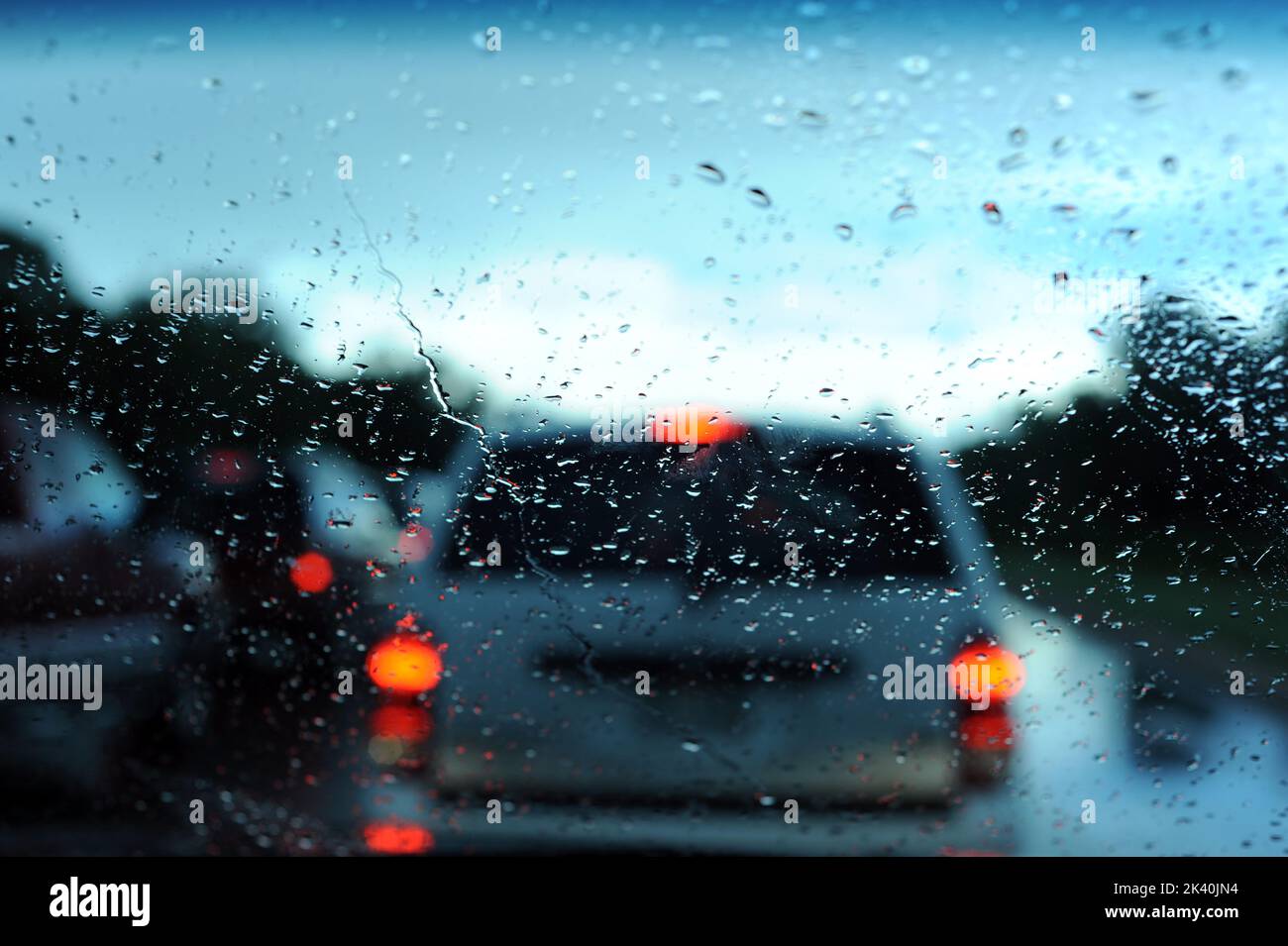 Road view through car window with rain drops stock photo Stock Photo ...