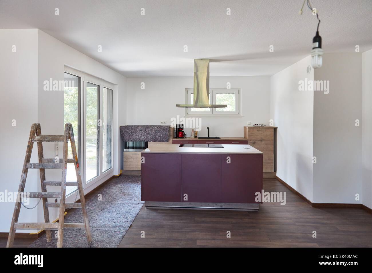 Kitchen island in kitchen during painting work in a new house Stock ...