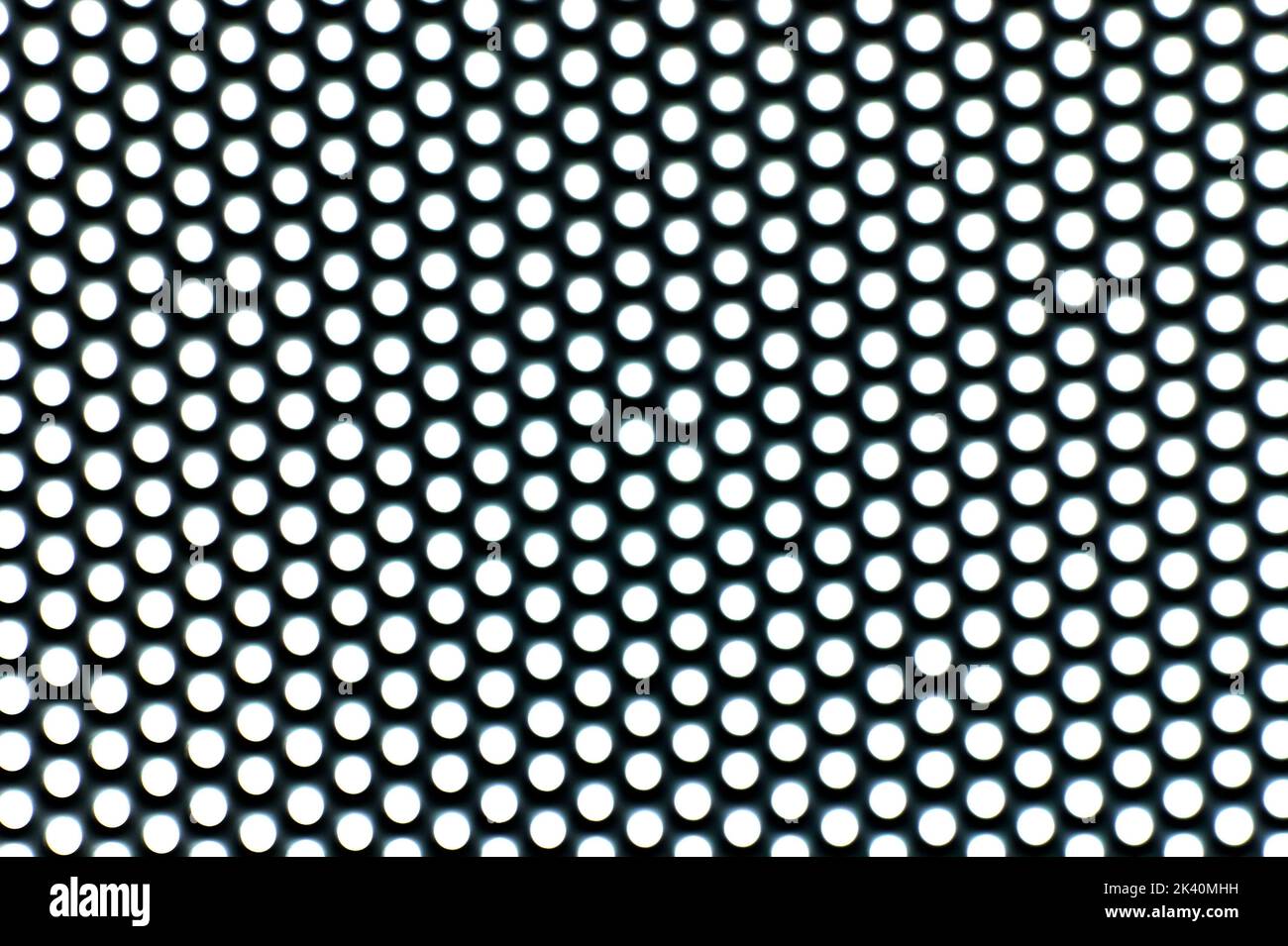 Metal background with holes stock photo Stock Photo - Alamy