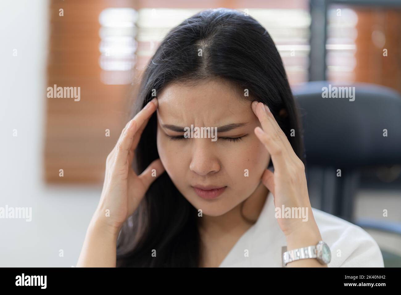 Portrait of stressed asian businesswoman in the office. burnout ...