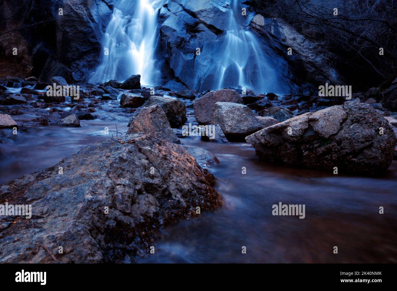 Devils garden canyon rows of rock formations and waterfall stock photo ...