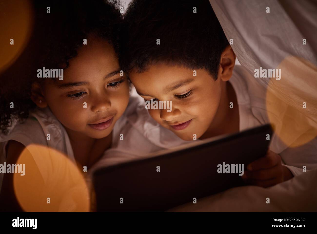 Children use tablet hi-res stock photography and images - Alamy