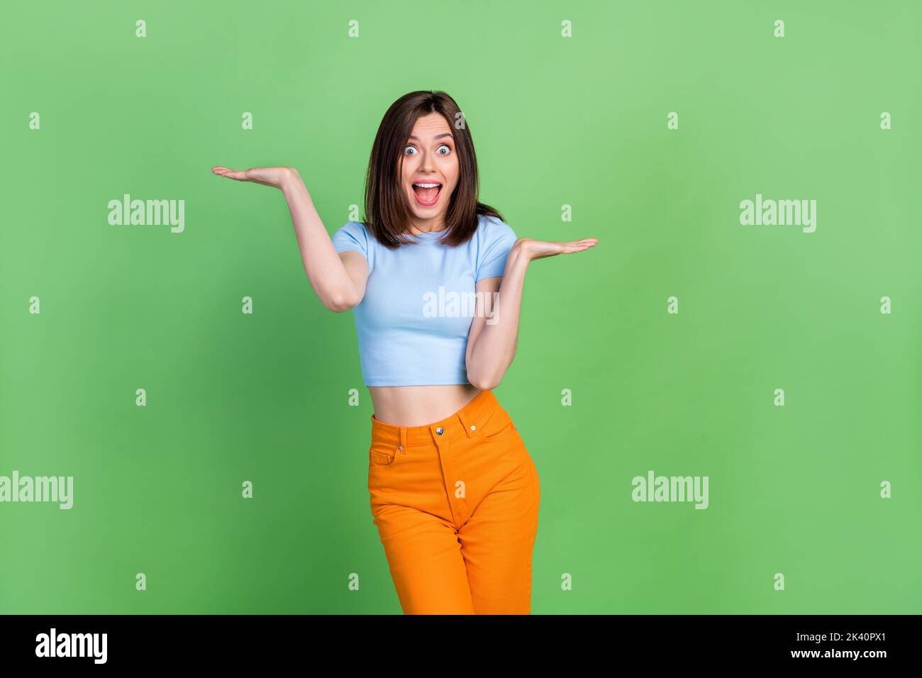 Photo of excited funny lady arms hold empty space vs scales solution ...