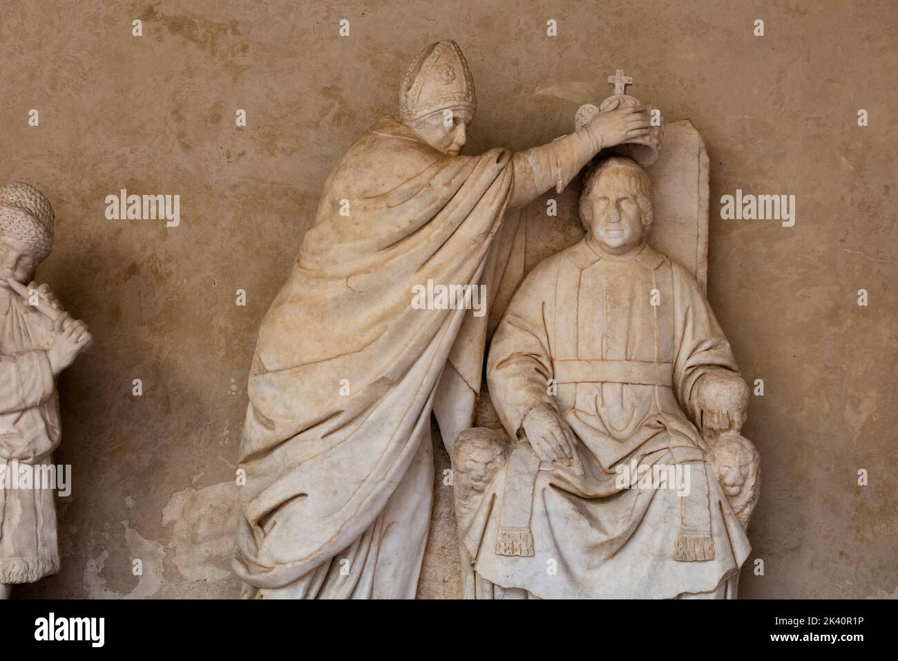 Sculpture of the coronation of Ferdinand I of Aragon, in the courtyard ...