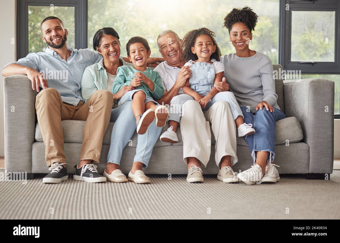 Portrait of happy big family relax on sofa during annual reunion with ...