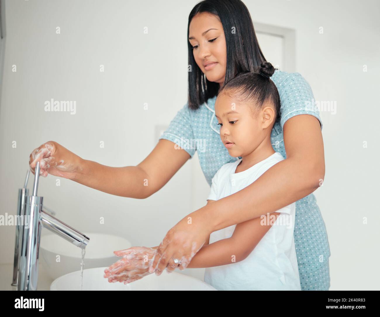 Mom help, teaching girl to washing hands or cleaning with water for ... Mom help, teaching girl to washing hands or cleaning with water for ...