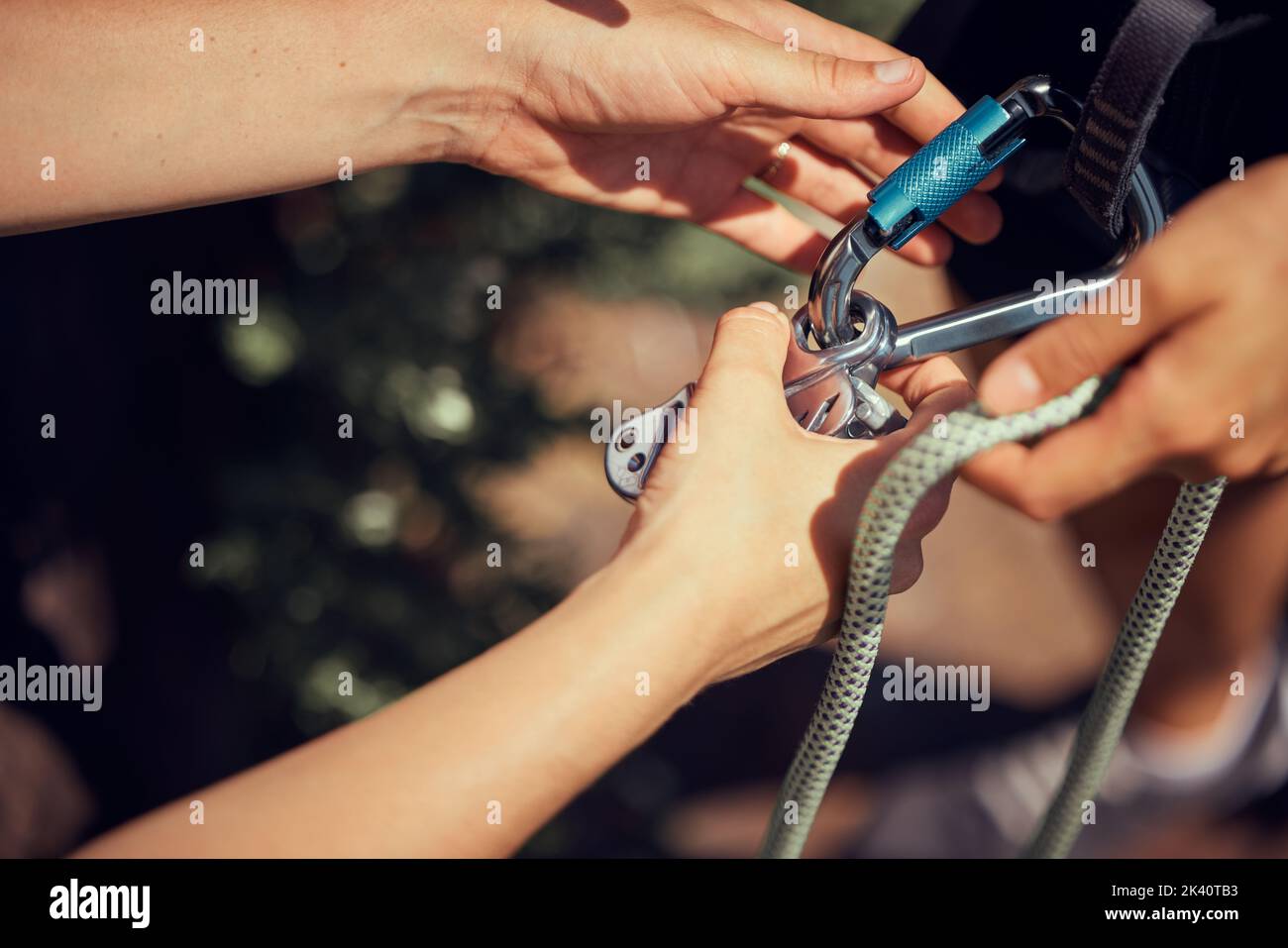 Hands, sports and climbing gear for mountain adventure preparing rope ...