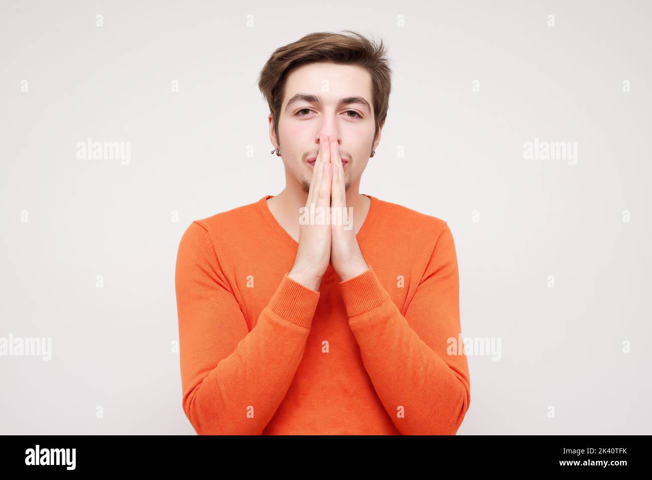 Praying man stock photo Stock Photo - Alamy