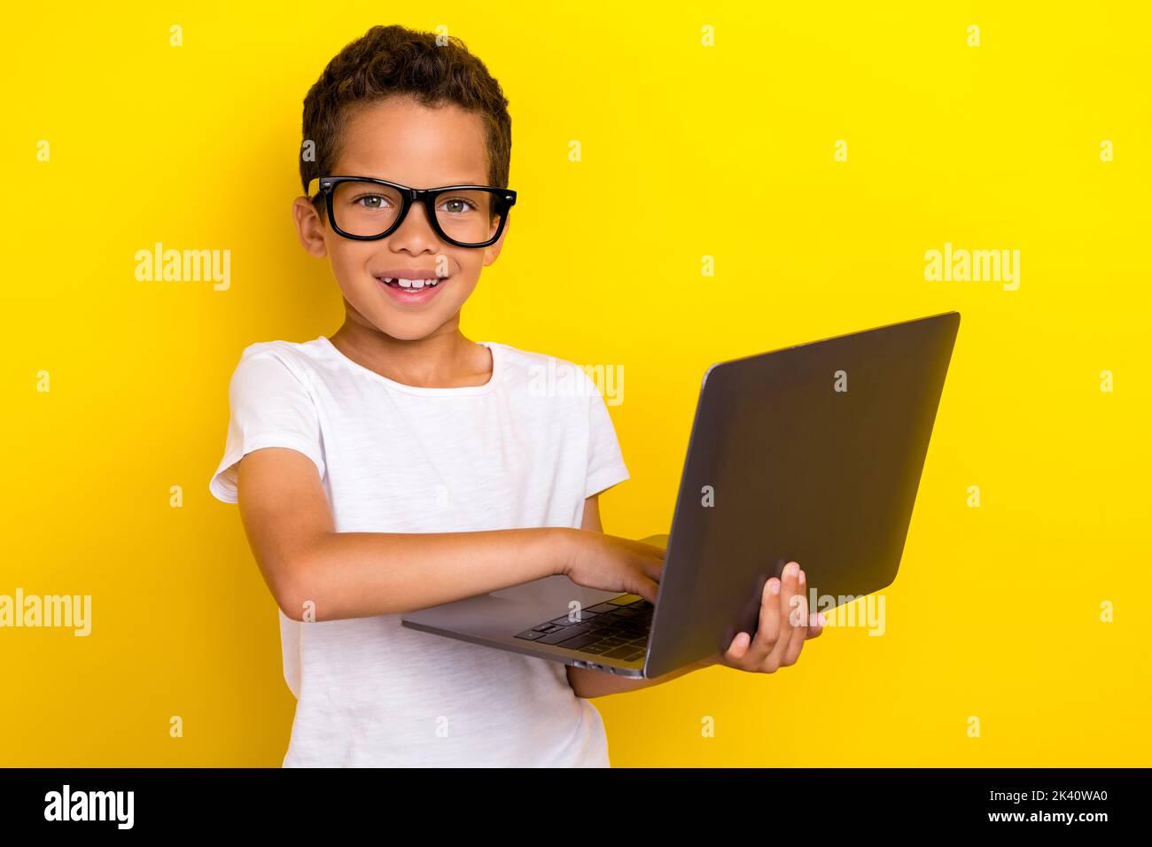 Photo of manager little boy work laptop wear white t-shirt eyewear ...