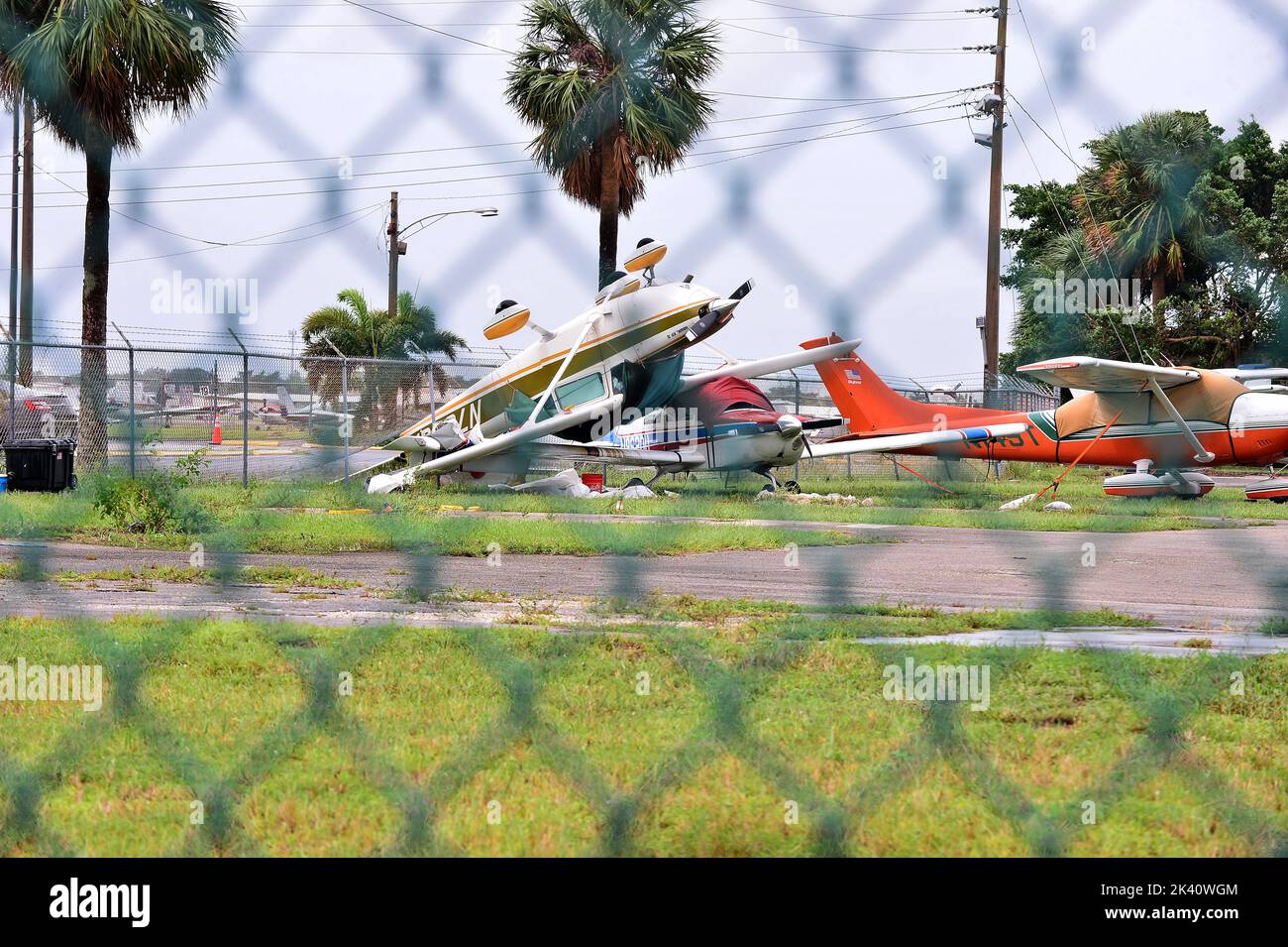 Airplanes damages at the North Perry Airport Wednesday tarmac following ...