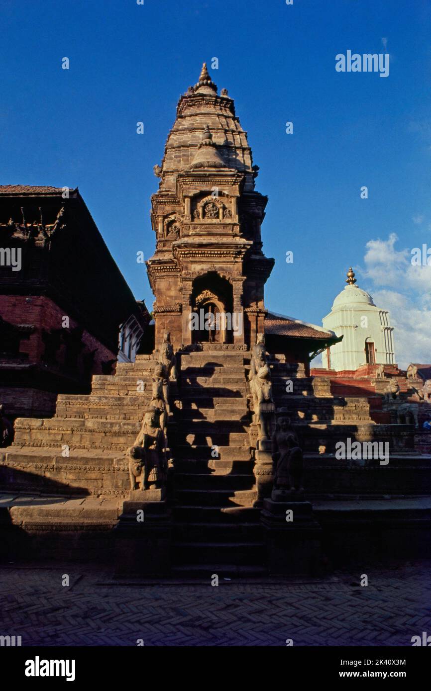 Temple from Darbar Square and various animals in stone on the staircase ...