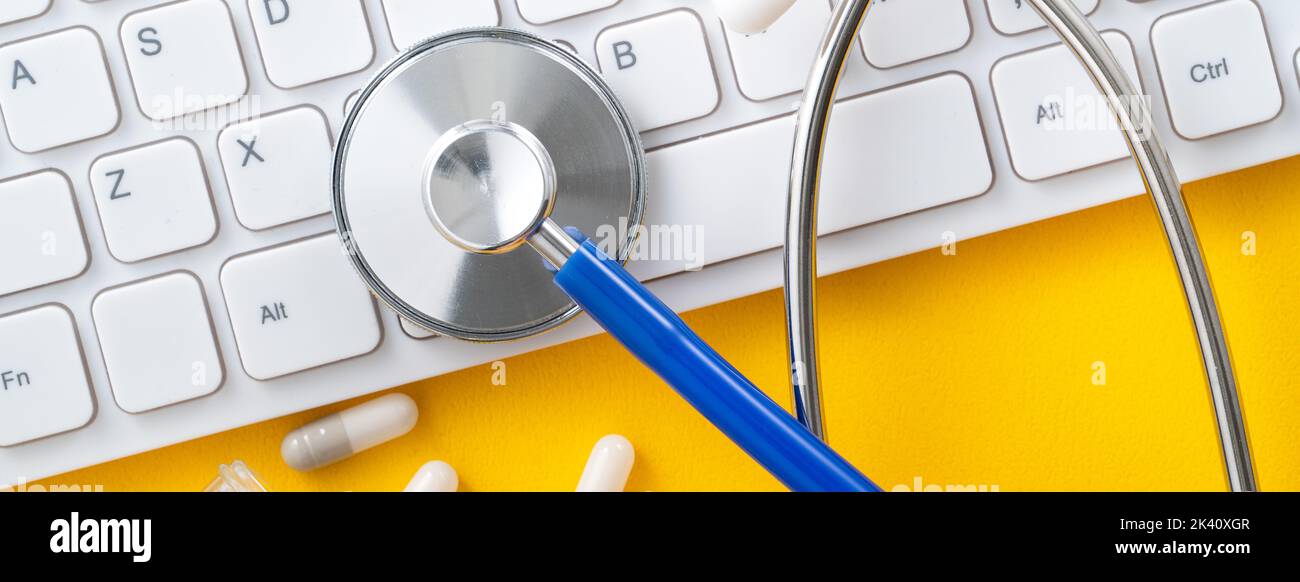 Doctor diagnoses design concept - stethoscope with computer keyboard ...