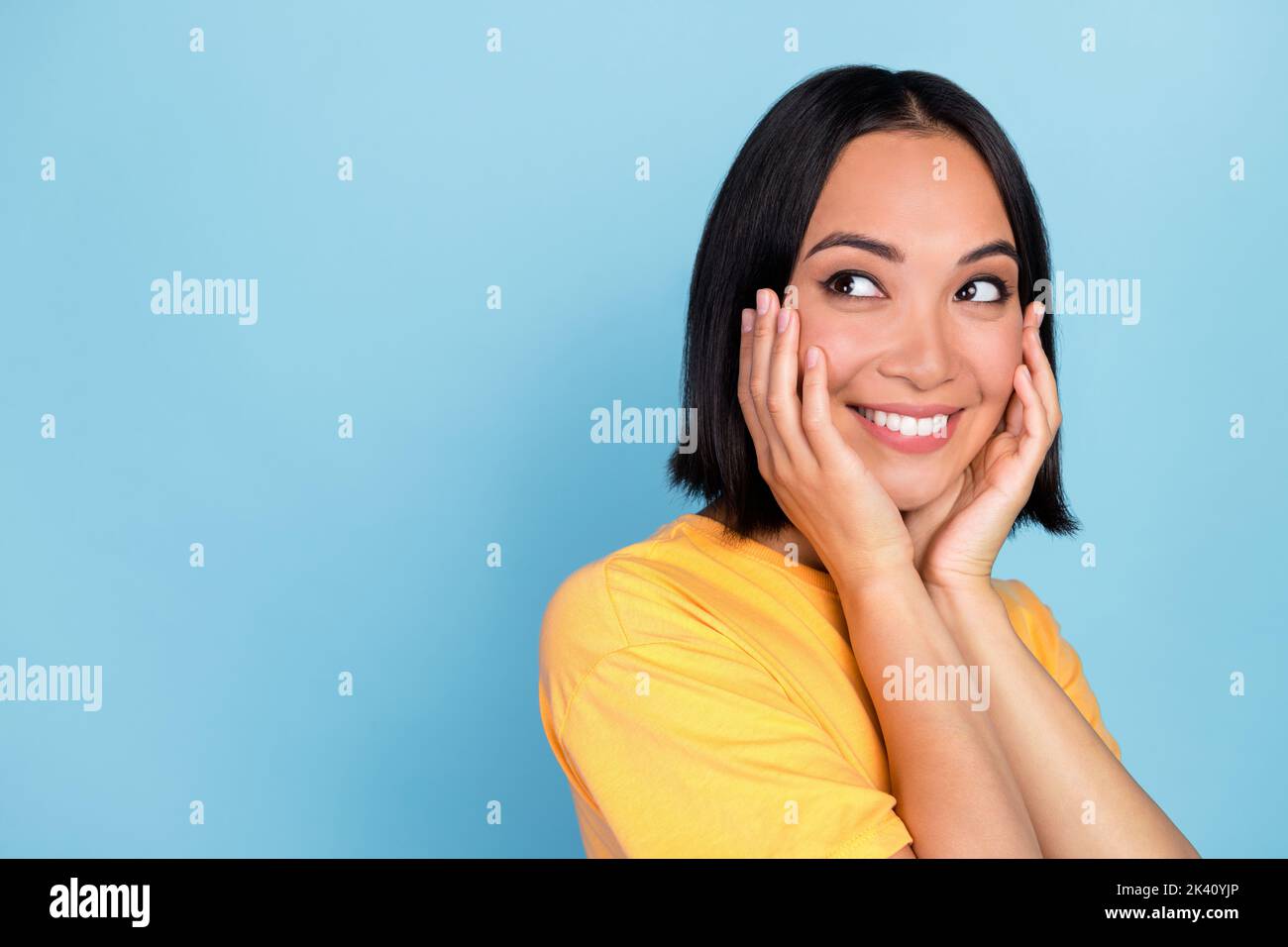 Portrait Of Positive Curious Nice Girl With Bob Hairstyle Wear Yellow T