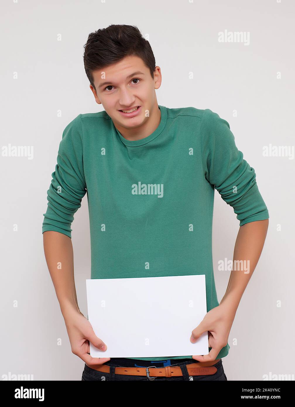 A smiling handsome male with blank board stock photo Stock Photo - Alamy