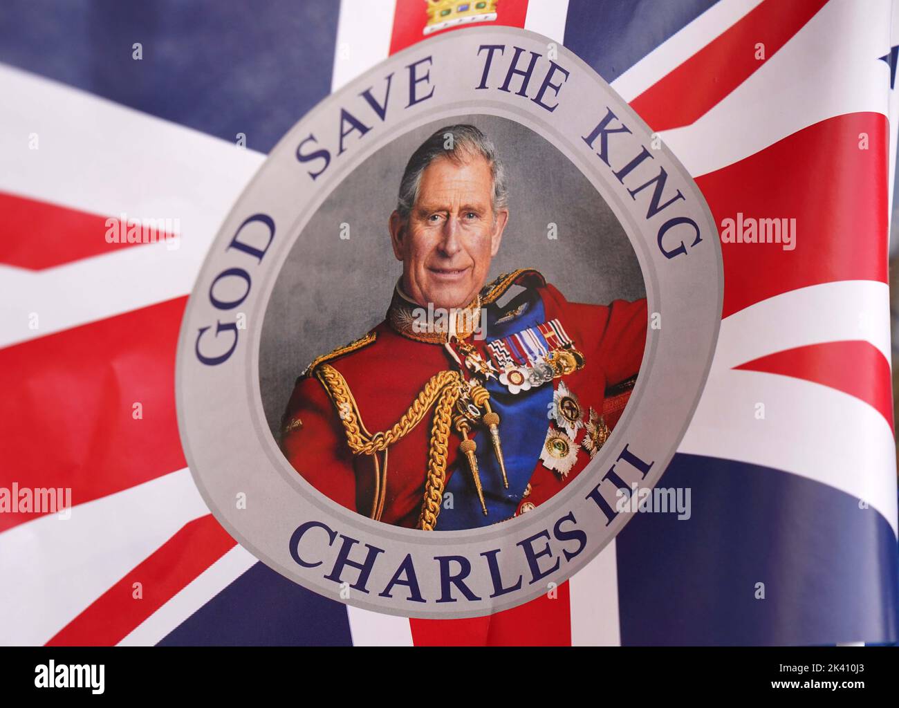 A souvenir flag depicting King Charles III on display at a memorabilia ...