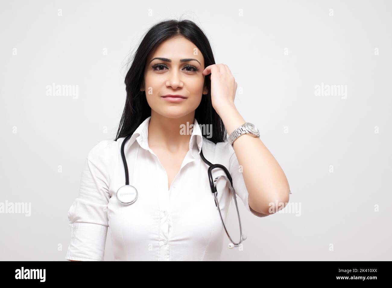 Portrait of beautiful female doctor doing different things - Stock ...