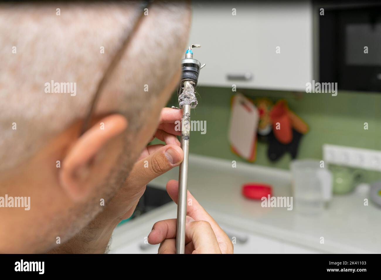 limescale and deposits on the heating element of a washing machine ...