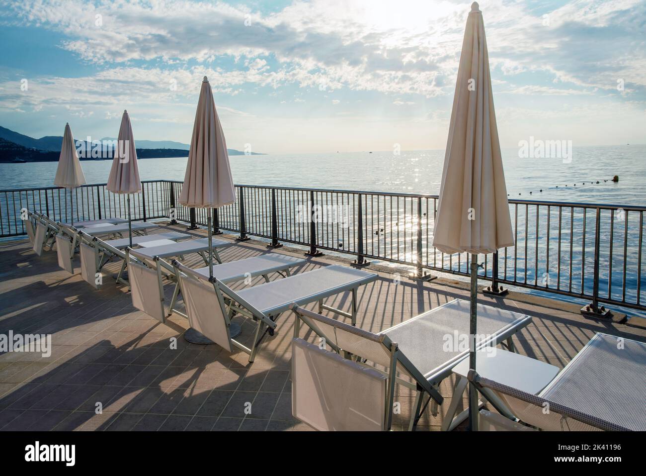 Fantastic morning in Monaco: typical sun loungers and covered white ...